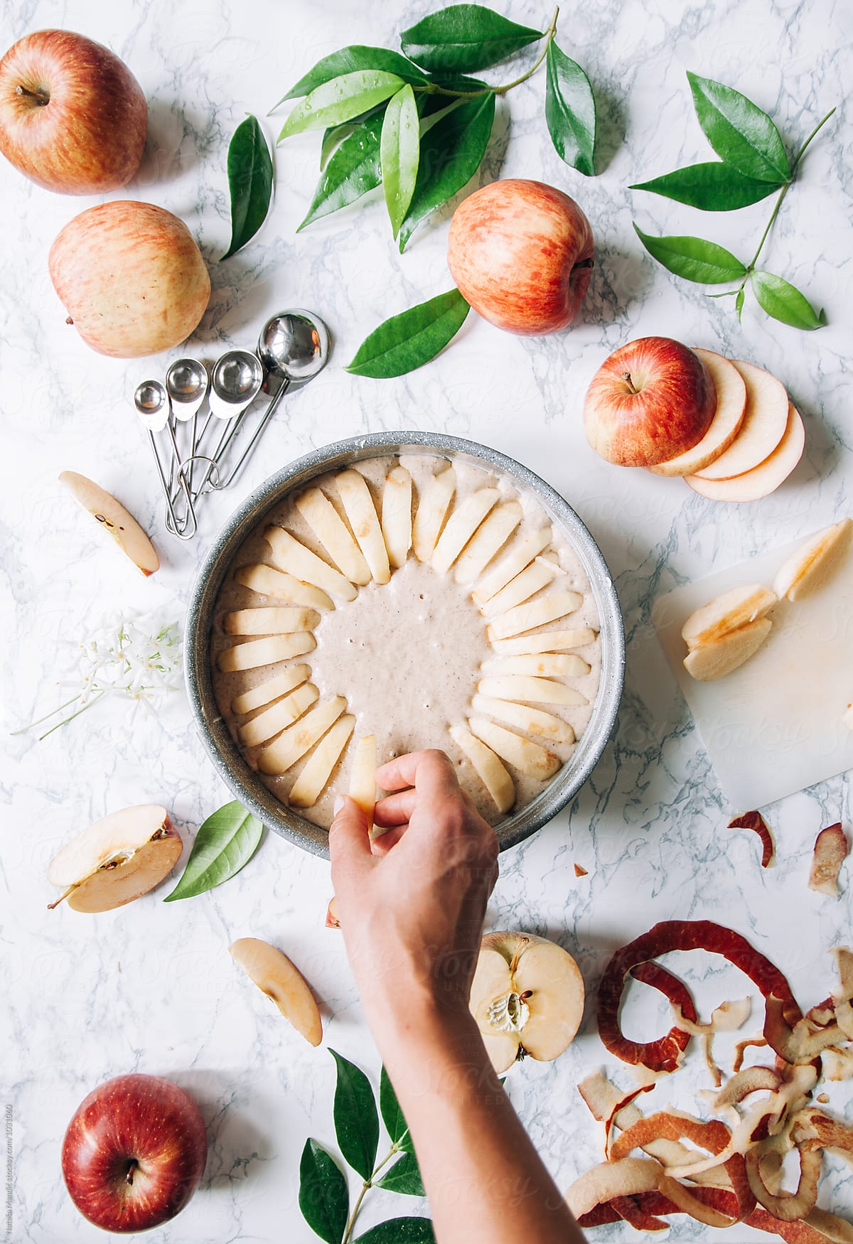 "Preparing An Apple Cake" by Stocksy Contributor "Nataša Mandić" - Stocksy
