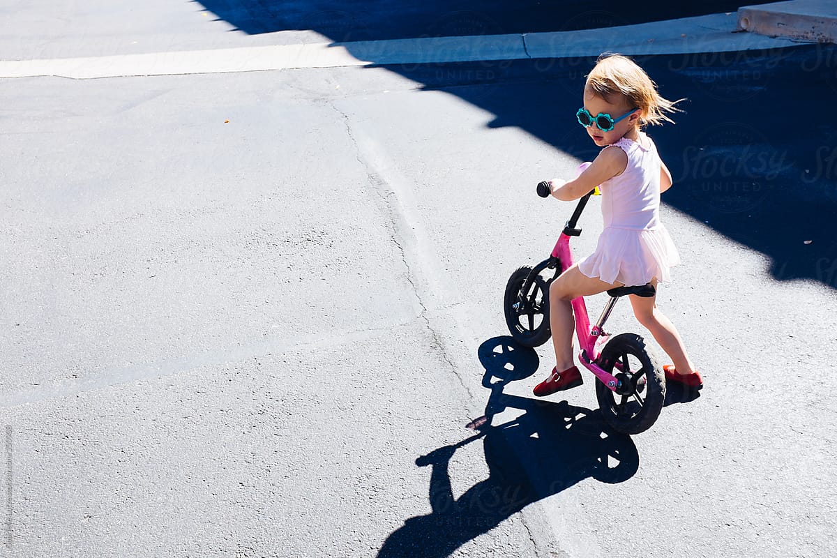 "Cute Little Girl Riding A Pink Bike" by Stocksy Contributor "Gabrielle ...