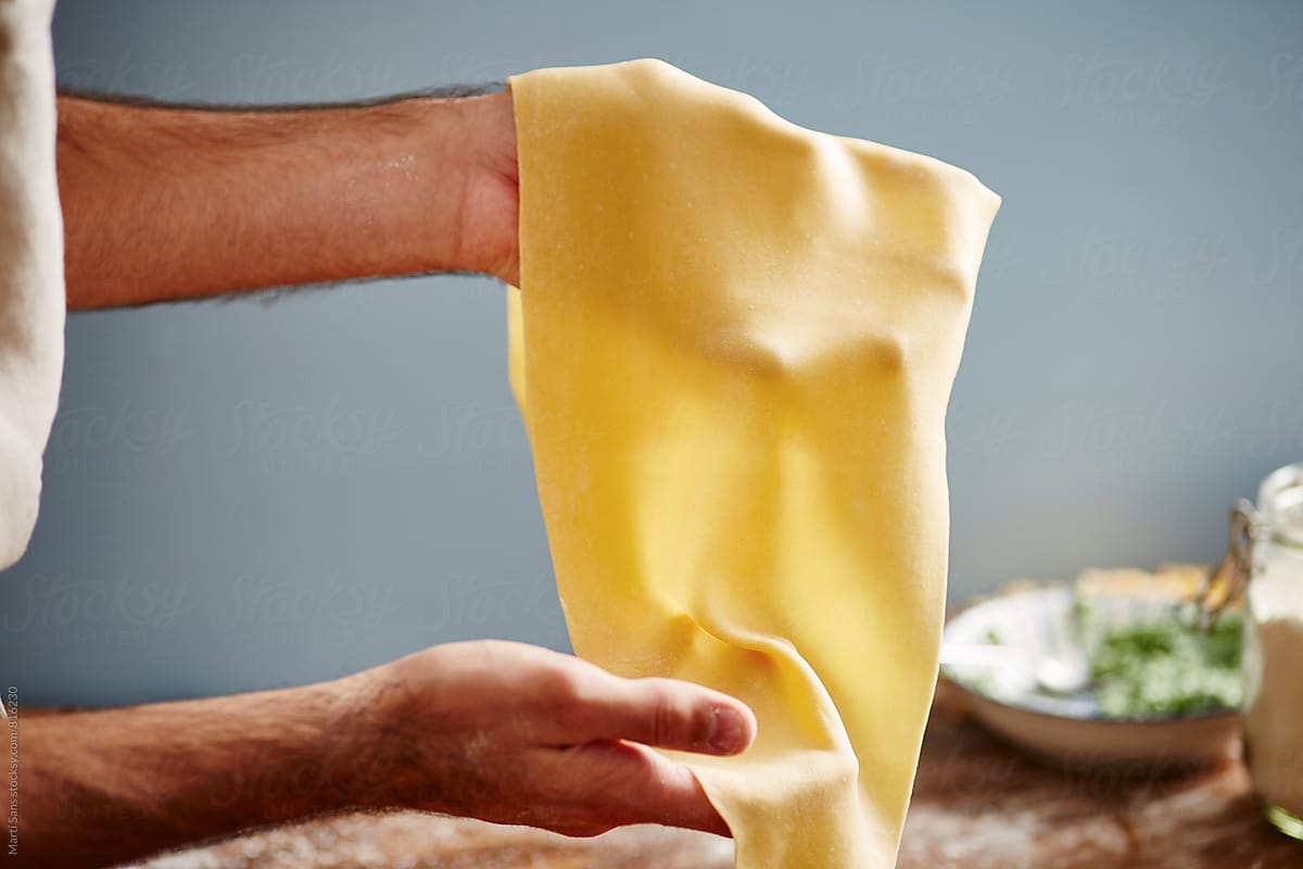 "Stretching Homemade Fresh Pasta Dough" by Stocksy Contributor "Martí ...