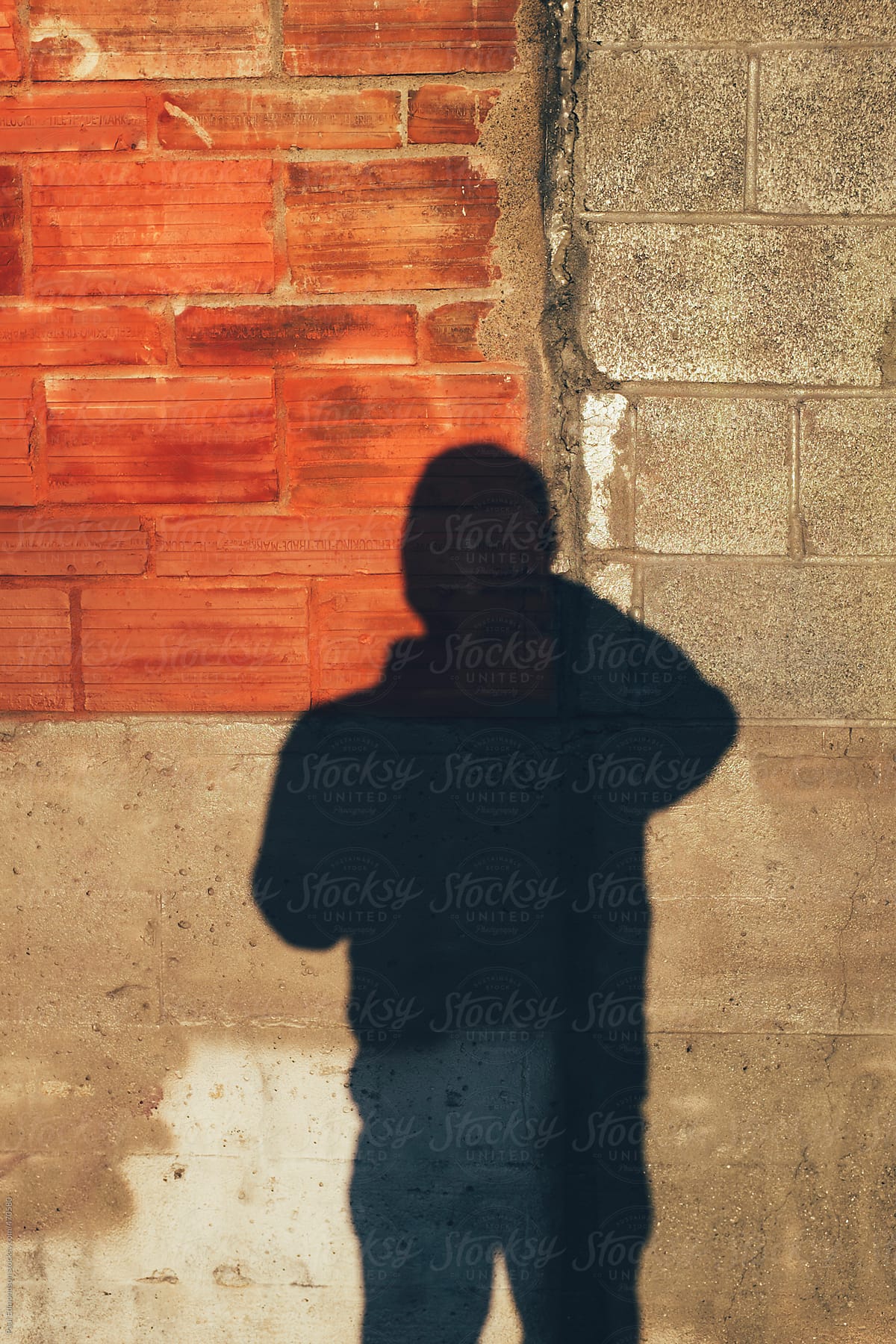 "Shadow Of Photographer Taking Photo Of Building Wall" by Stocksy ...