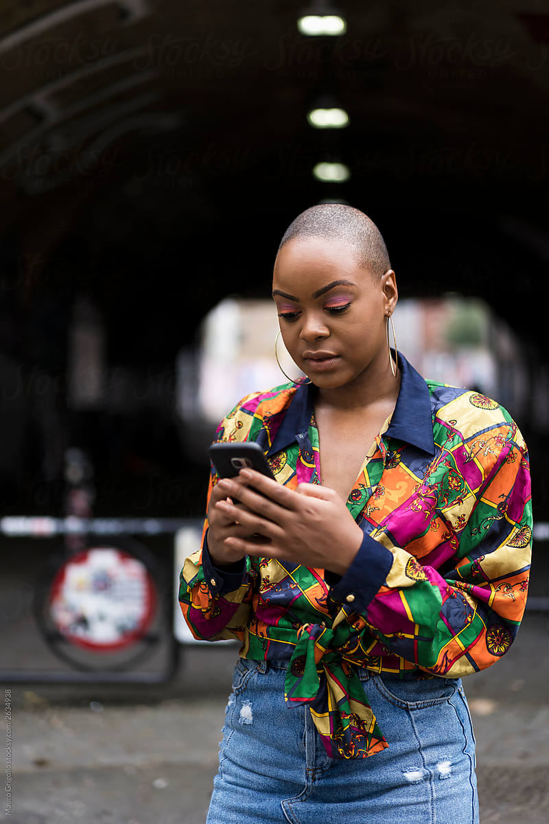 "Black Woman Using A Mobile Phone To Call Friends." by Stocksy ...