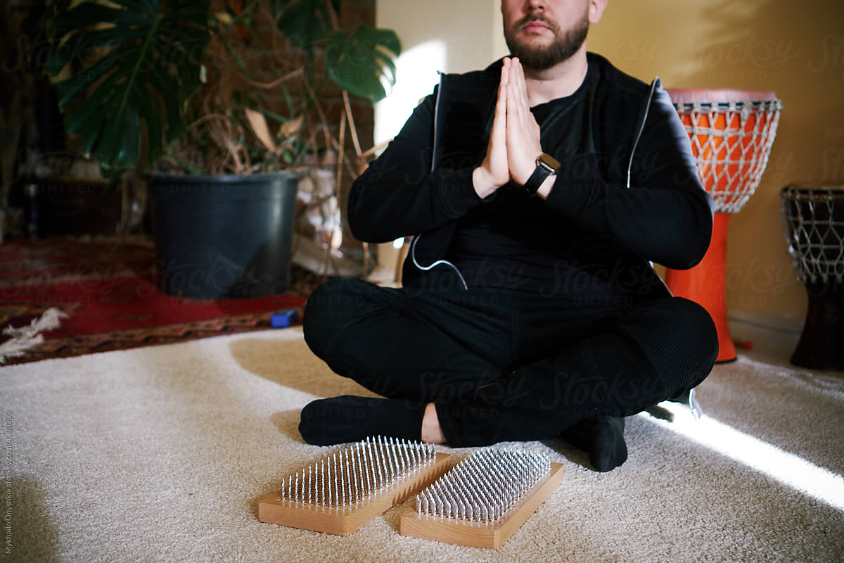 "Namaste Gesture In Front Of Yoga Desk" by Stocksy Contributor "Misha ...