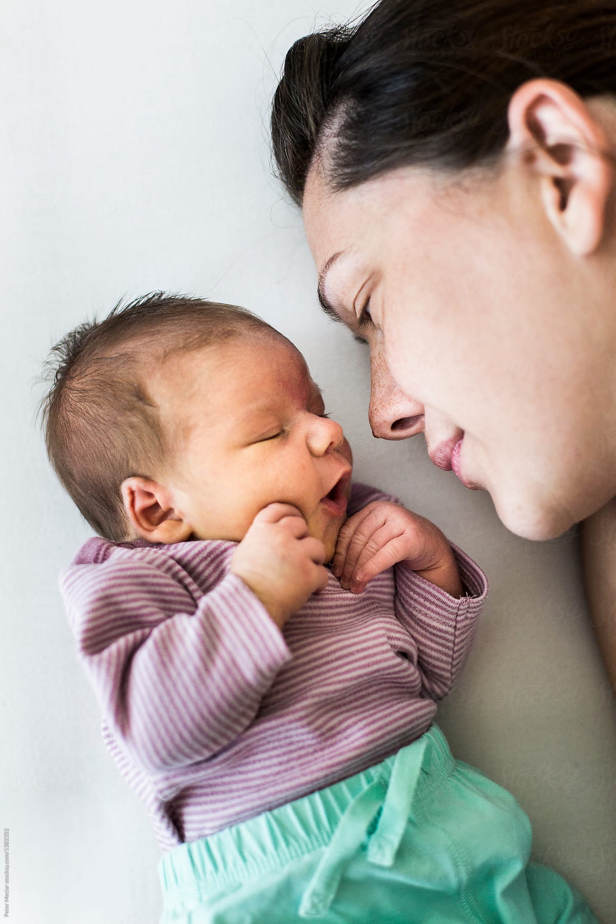 "Family Time With Two Kids" by Stocksy Contributor "Peter Meciar" - Stocksy
