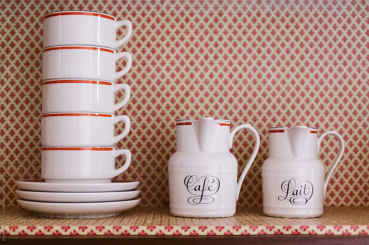 "Coffee Mugs In Cupboard" by Stocksy Contributor "Raymond Forbes LLC ...