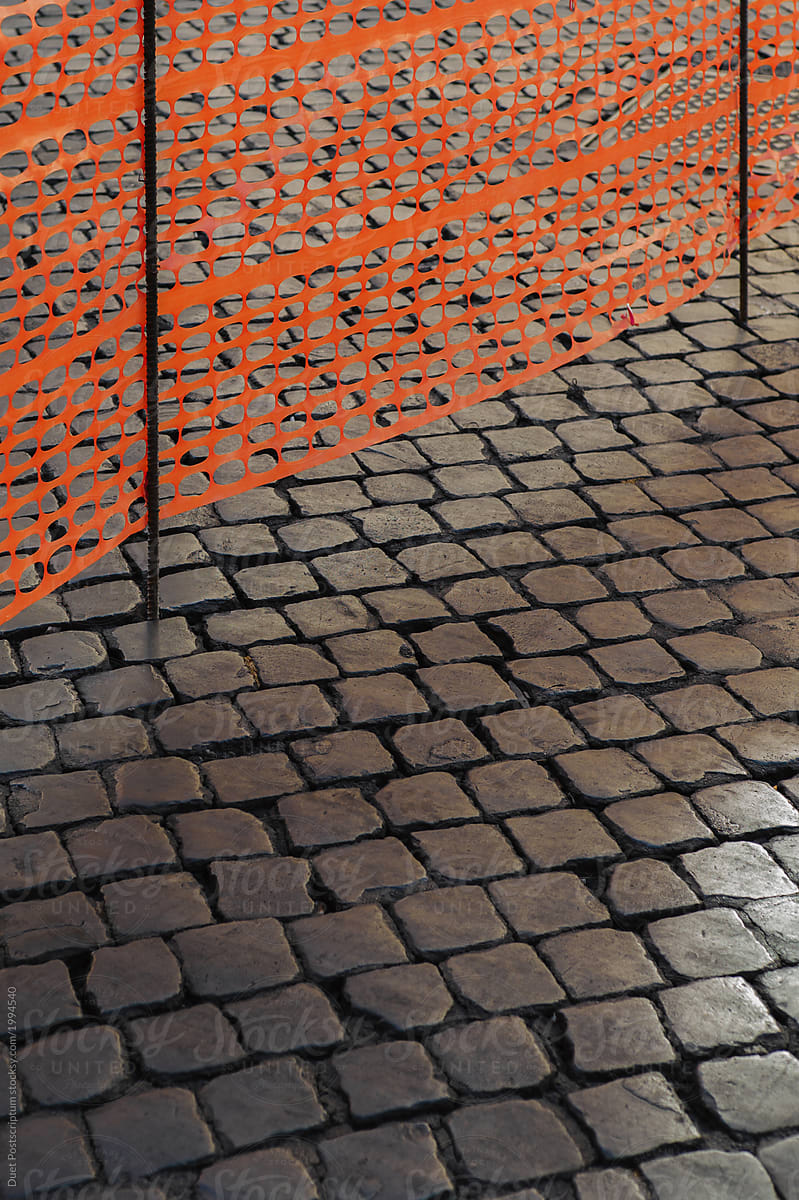"Cobblestone Pavement And Restricting Net" by Stocksy Contributor "Duet ...