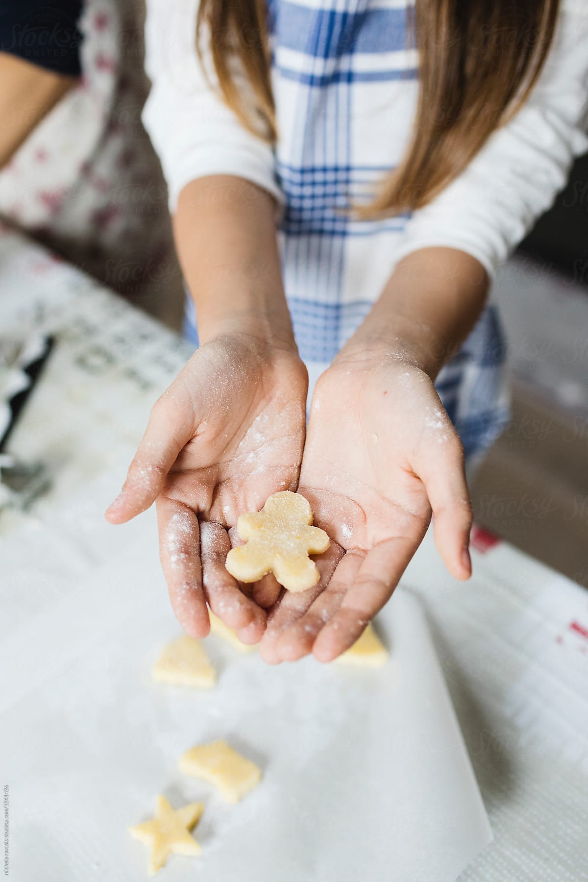 "Little Girl Shows A Freshly Made Biscuit" by Stocksy Contributor ...