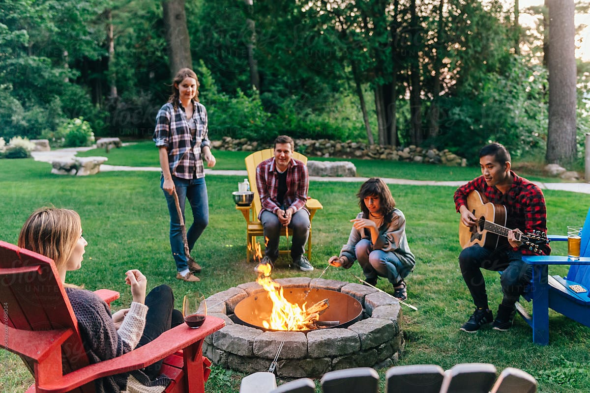 "Friends Around The Campfire" by Stocksy Contributor "Jen Grantham ...