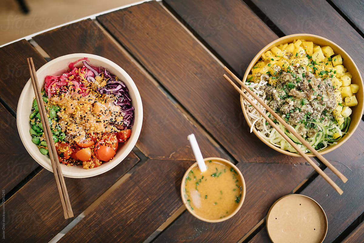 "Bowls With Tasty Poke On Table" by Stocksy Contributor "Javier Díez ...