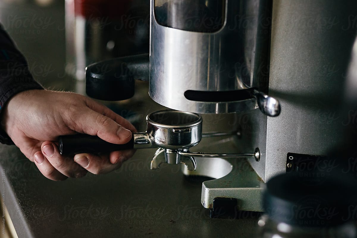 "Barista Using Coffee Grinder" by Stocksy Contributor "Aleksandar ...