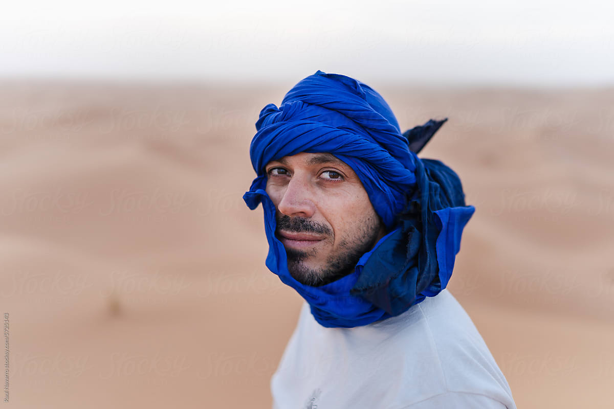 "Portrait Of An Adult Man Wearing A Blue Turban In The Desert" by ...
