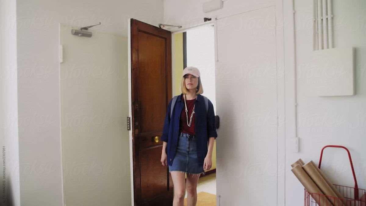 "Professional With Backpack Walking In Office" by Stocksy Contributor ...