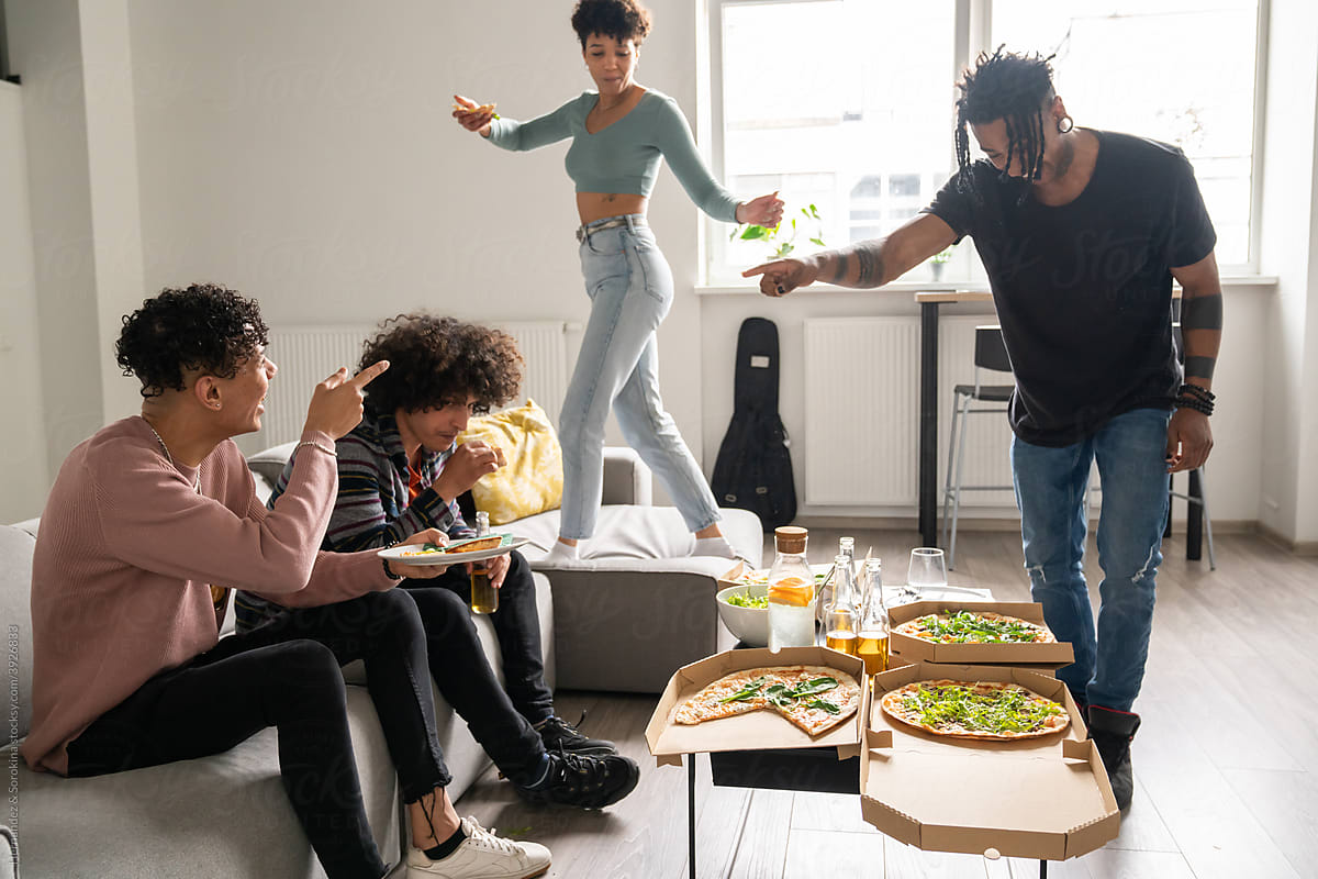 "Friends Having Pizza At Home" by Stocksy Contributor "Hernandez ...