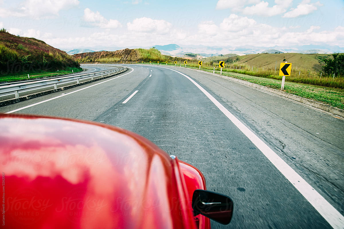 "Road Trip In A Red Car Around Brazil" by Stocksy Contributor "Luciano ...