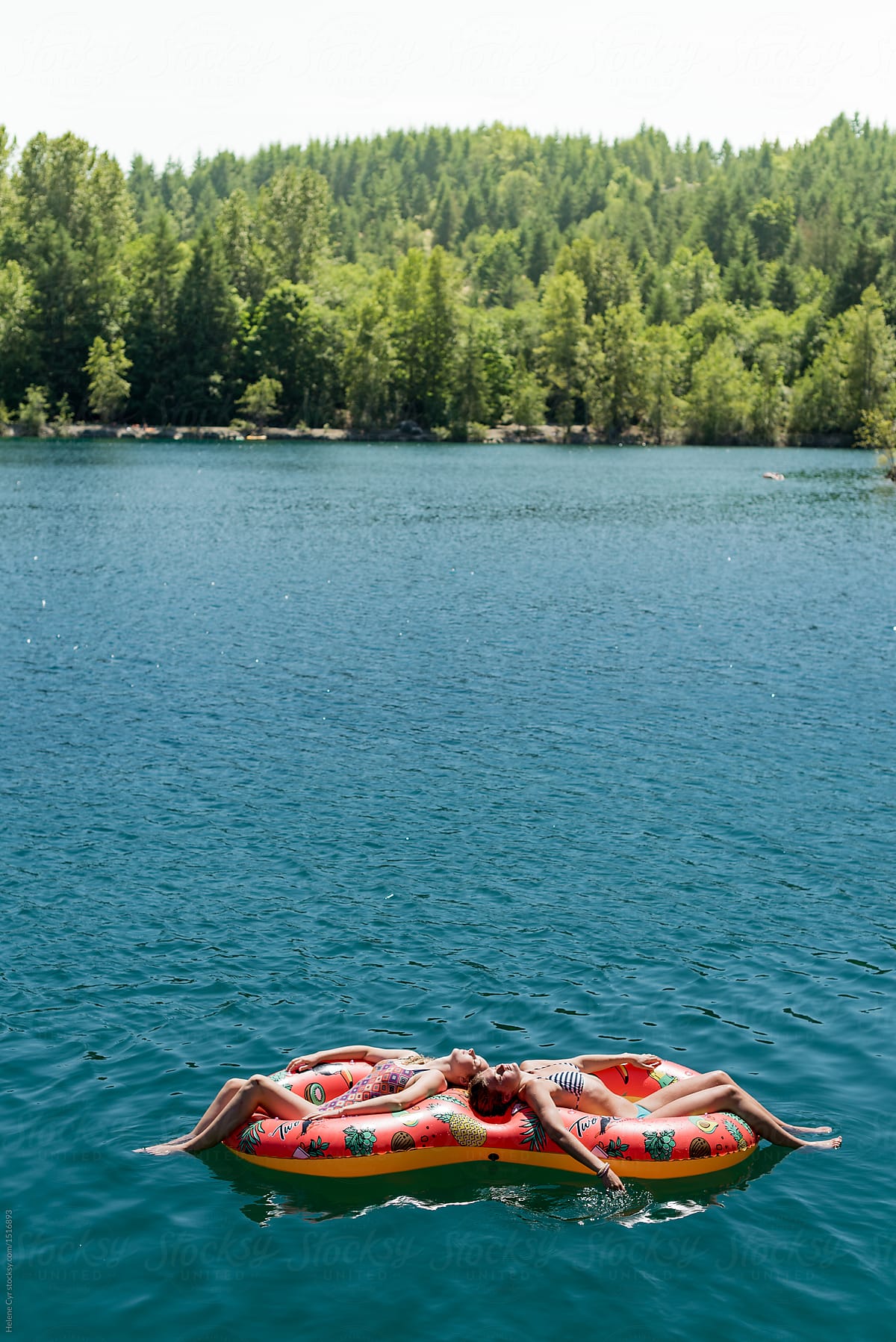 "Floating On A Lake" by Stocksy Contributor "Helene Cyr" - Stocksy