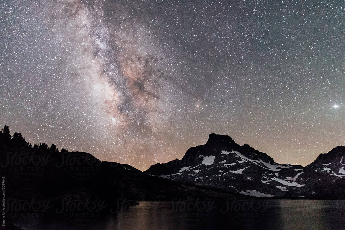 "Stars And The Milky Way Over The Mountain And Lake" by Stocksy ...