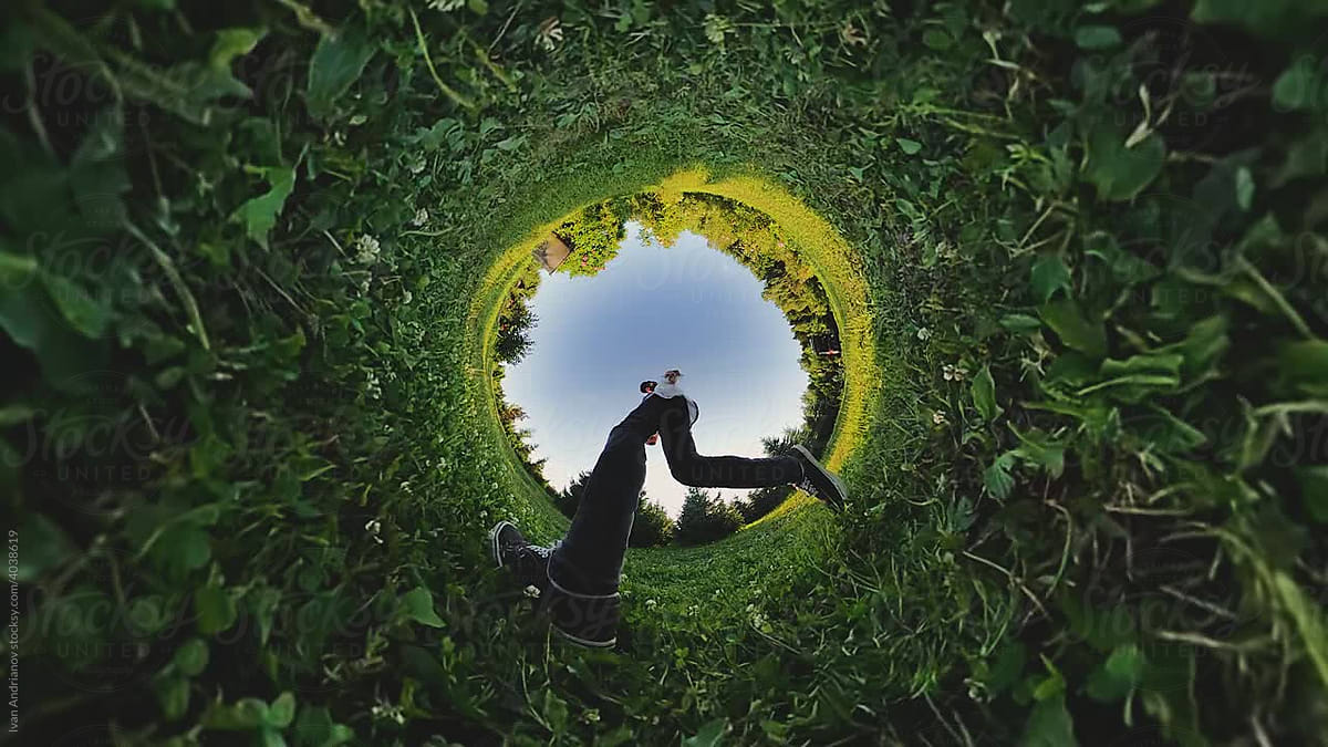 "Man Walks On Earth" by Stocksy Contributor "Ivan Andrianov" - Stocksy