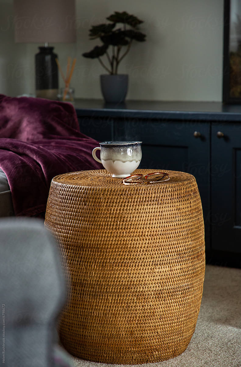"Cup Of Tea On A Rattan Table" by Stocksy Contributor "Helen Rushbrook ...