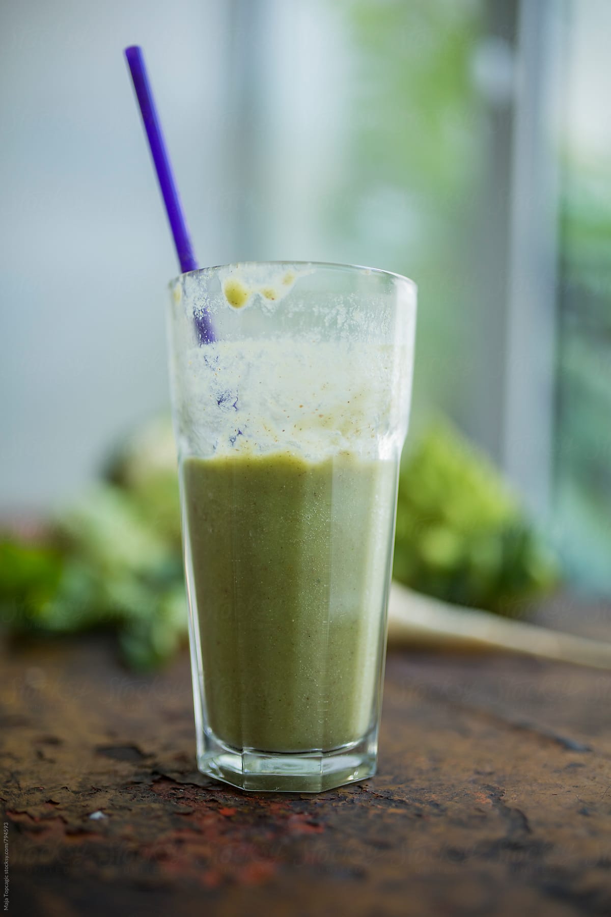 "Healthy Green Smoothie On Cracked Wooden Table" by Stocksy Contributor ...