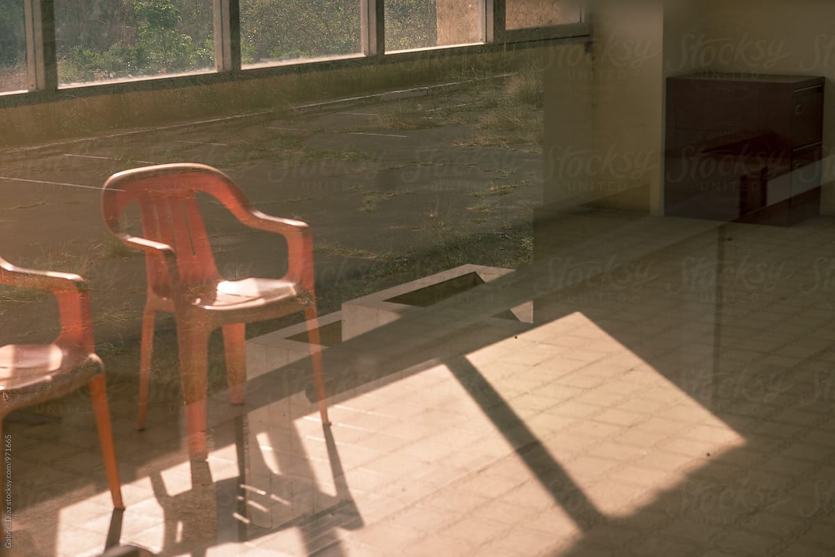 "Empty School Chairs" by Stocksy Contributor "Gabriel J. Diaz" - Stocksy