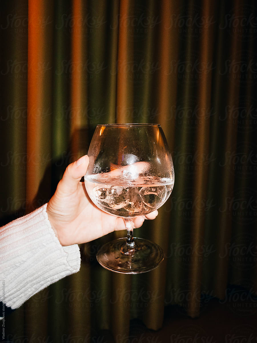 "Close-up Of A Hand Holding A Cocktail Glass" by Stocksy Contributor ...