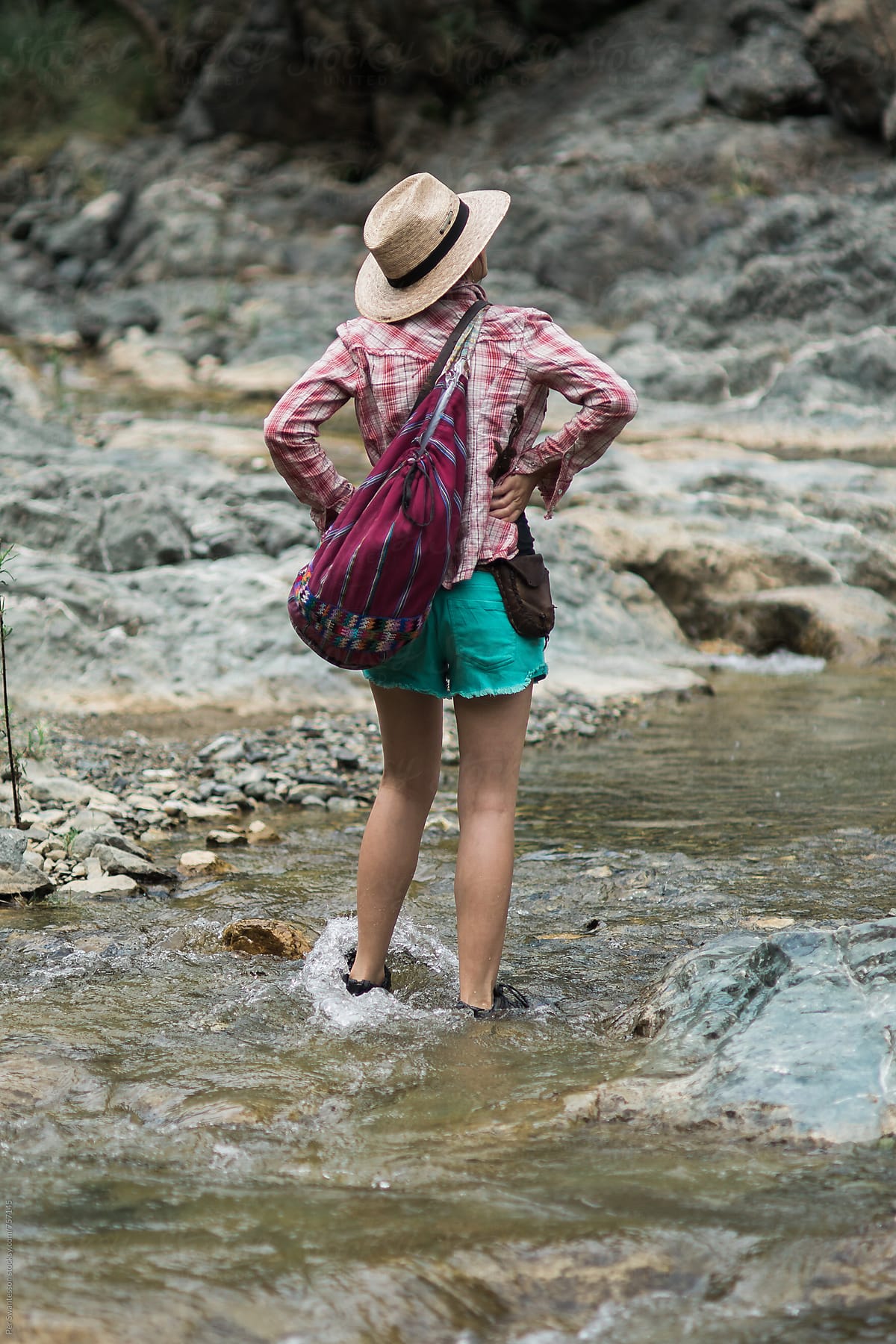 "Young Female Outdoor Explorer Walking In A River" by Stocksy ...