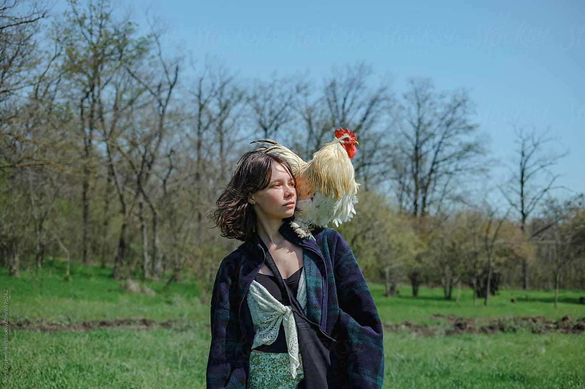 "Portrait Of A Woman With A Rooster" by Stocksy Contributor "Anna ...