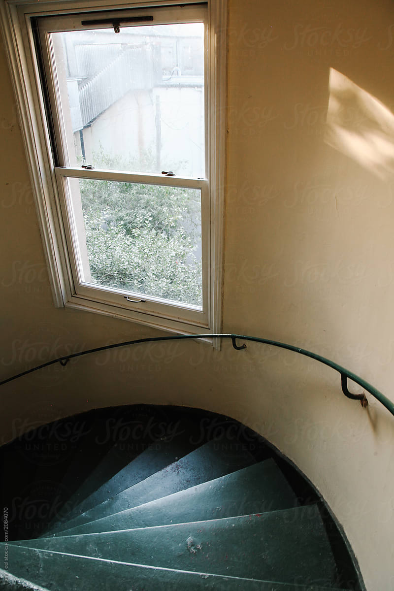 "Winding Staircase In Old Building" by Stocksy Contributor "Tana Teel ...