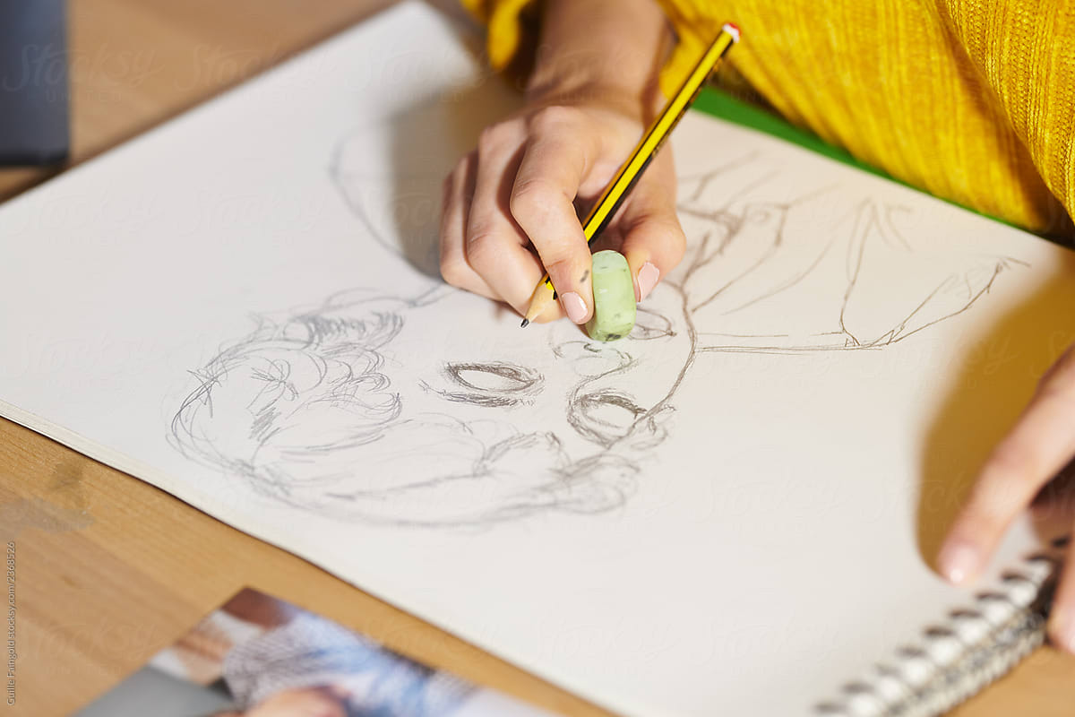 "Woman Erasing Graphic Portrait With Pencil" by Stocksy Contributor ...