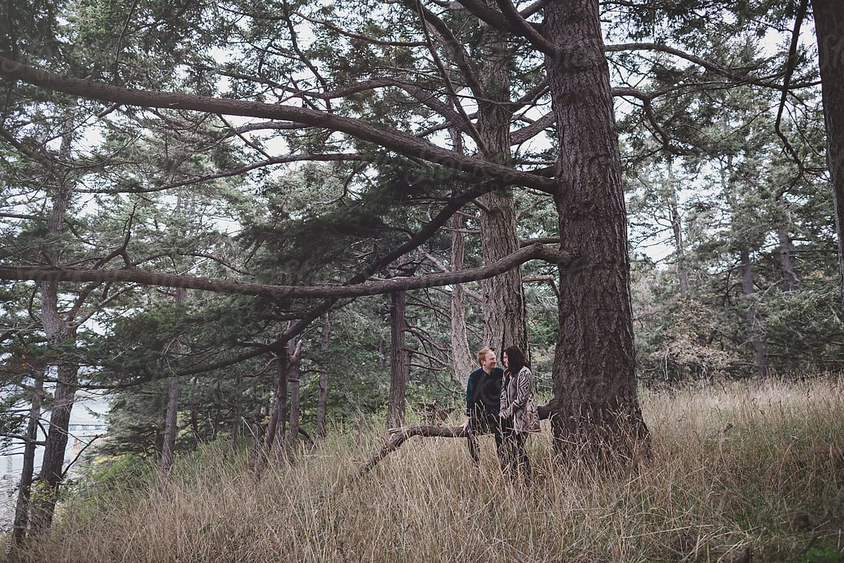 "Young Couple Enjoying Hanging Out Together In Nature - West Coast" by ...