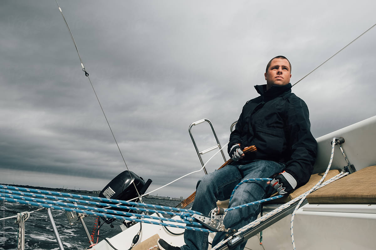 "Man Sailing" by Stocksy Contributor "Maryanne Gobble" - Stocksy