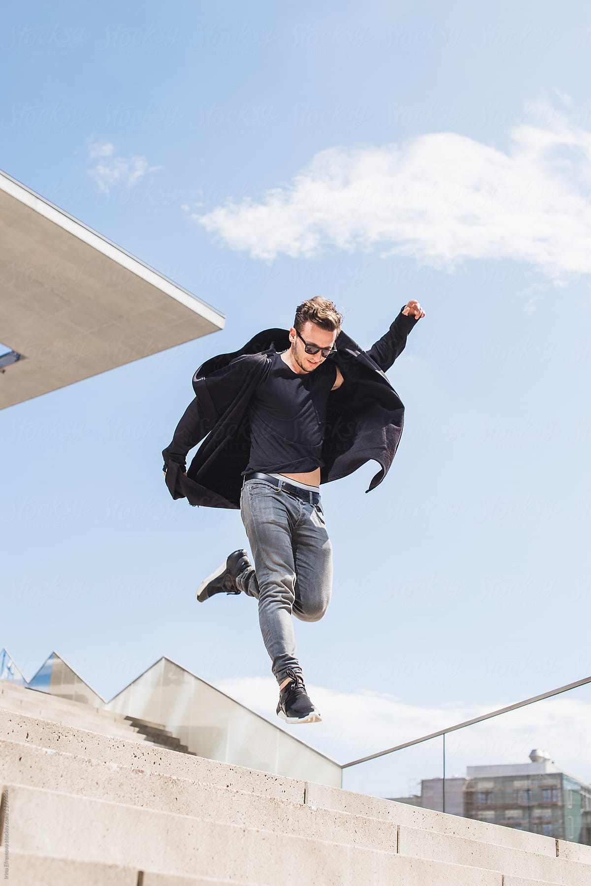 "Man Jumping Over Stairs" by Stocksy Contributor "Irina Efremova" - Stocksy