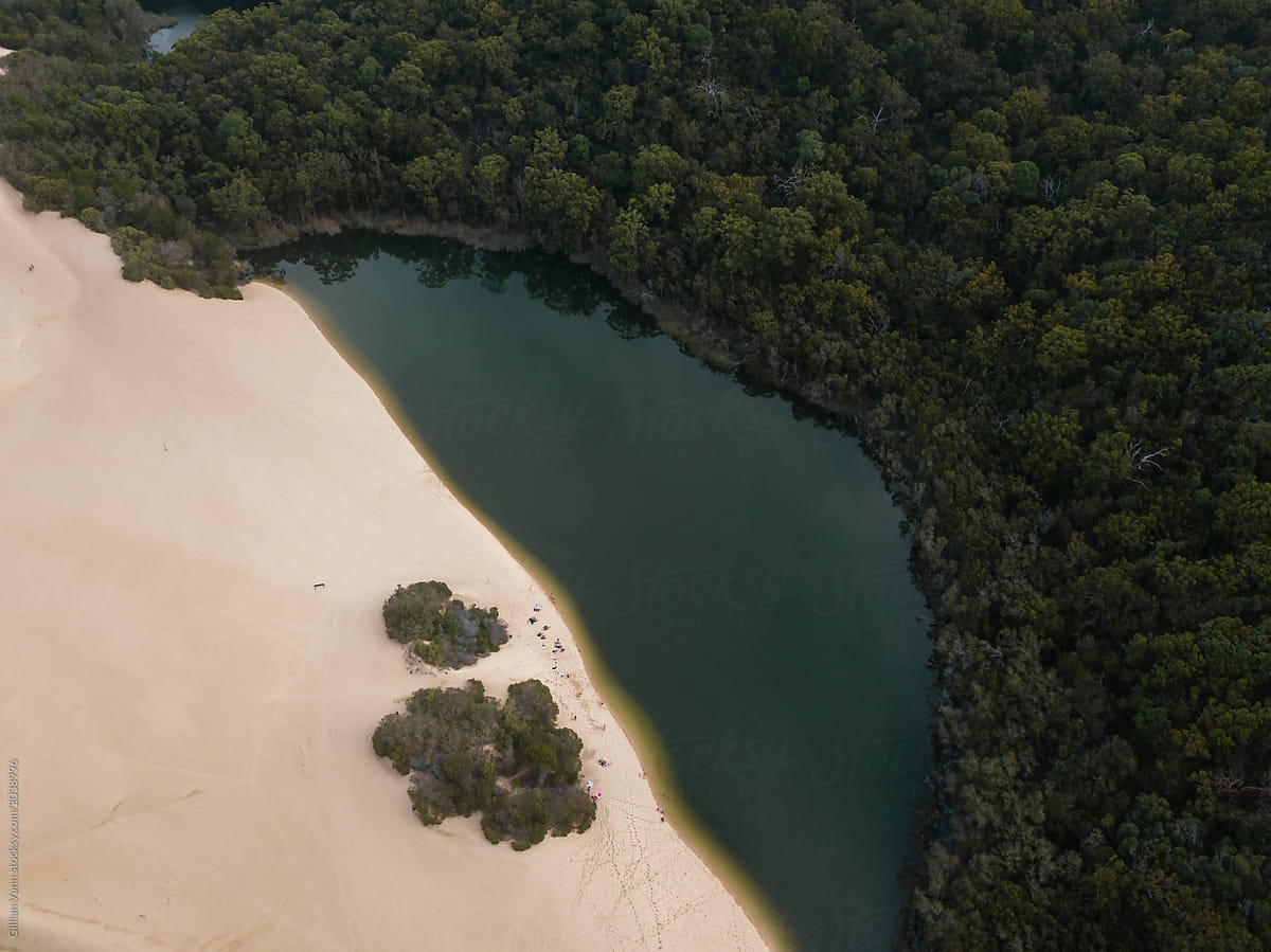 "Freshwater Lake By Sand Dune" by Stocksy Contributor "Gillian Vann ...