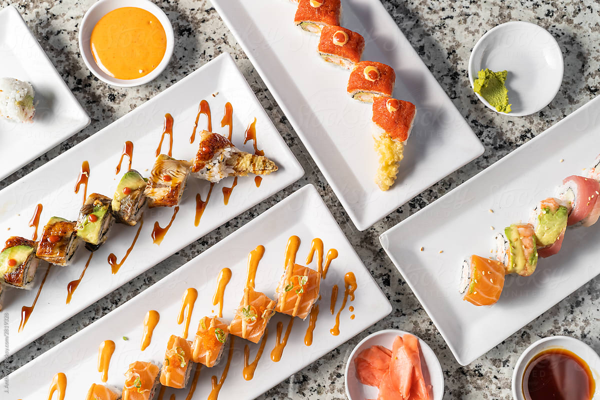 "Sushi Plates" by Stocksy Contributor "J. Anthony" - Stocksy