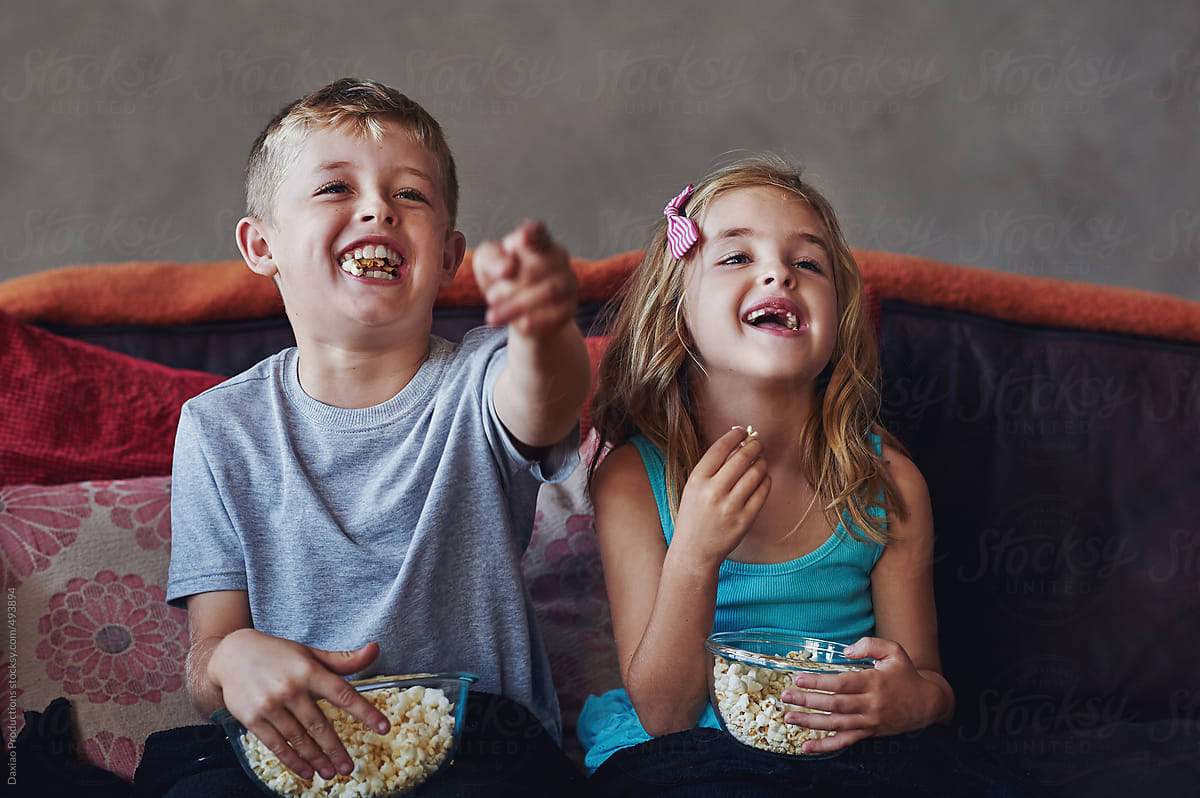 "Movie Popcorn Kids" by Stocksy Contributor "Daxiao Productions" - Stocksy