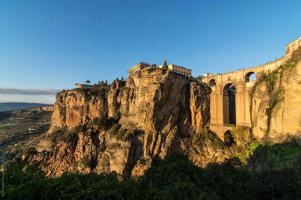"Bridge Near Mountains In Sunset" by Stocksy Contributor "Bisual Studio ...