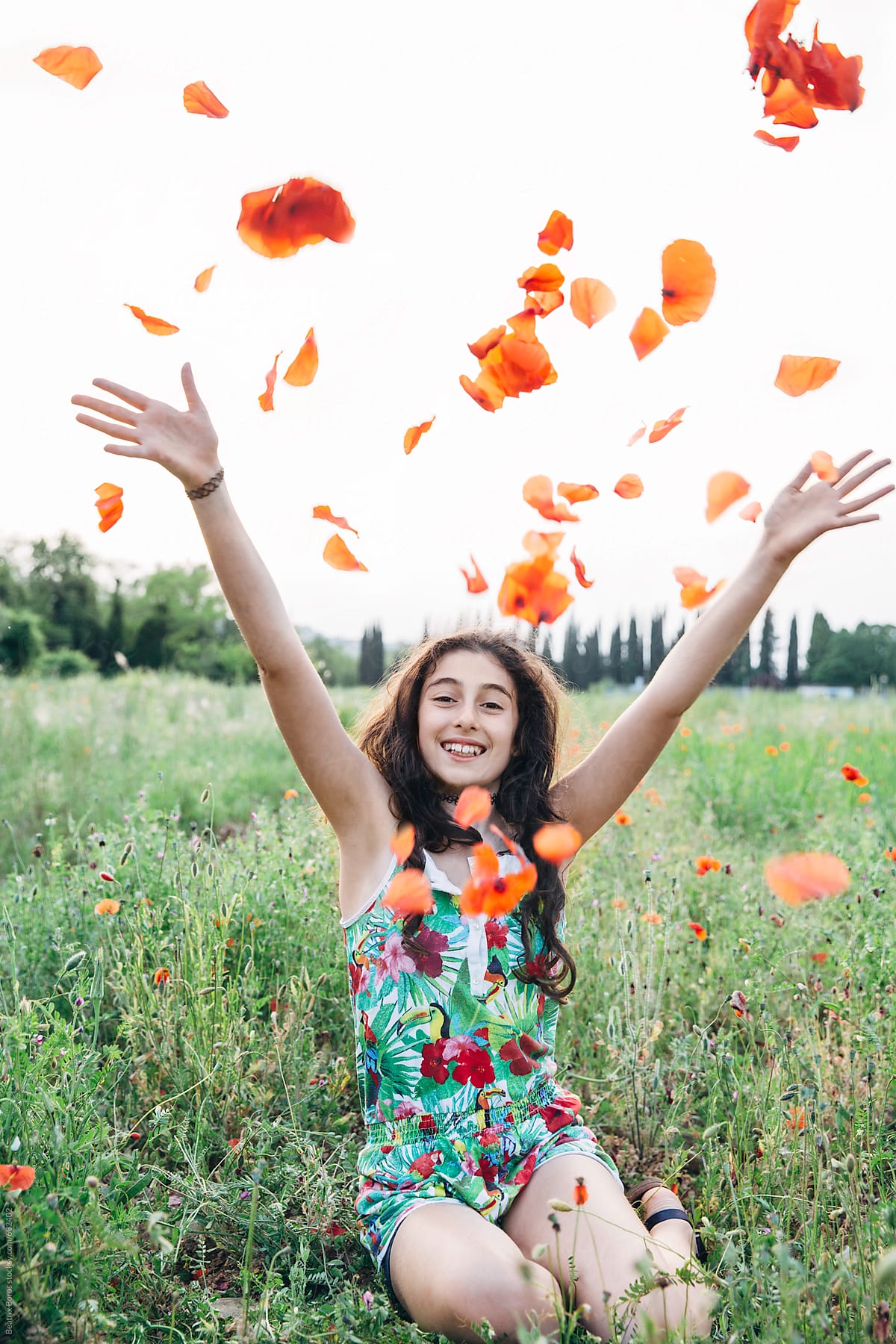 "Girl Throws Poppy Petals Over Her Head" by Stocksy Contributor ...