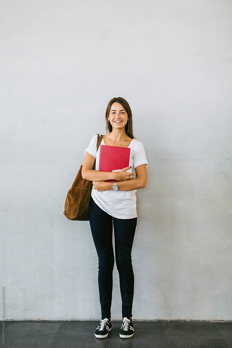 "Portrait Of A Young University Woman In A Library." by Stocksy ...