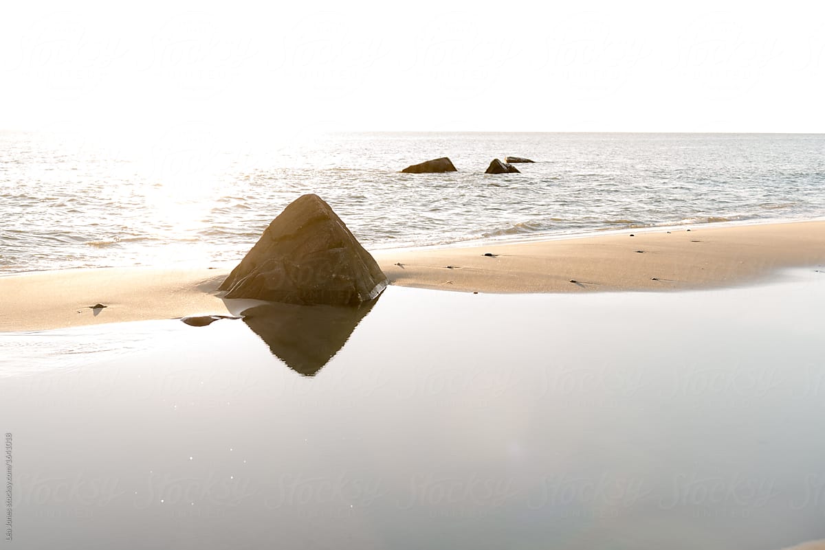 "Rock On Beach At Sunset" by Stocksy Contributor "Lea Jones" - Stocksy