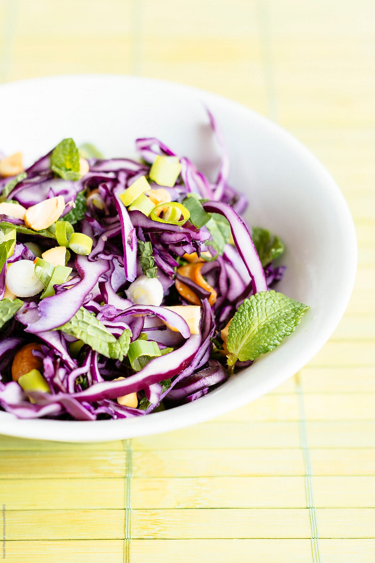 "Asian Red Cabbage Slaw With Peanuts, Scallions And Mint" by Stocksy ...