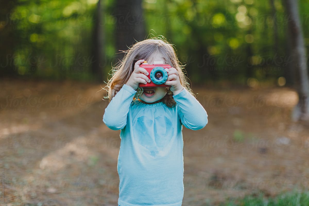 "Toddler Having Fun With A Toy Camera" by Stocksy Contributor "Jakob ...