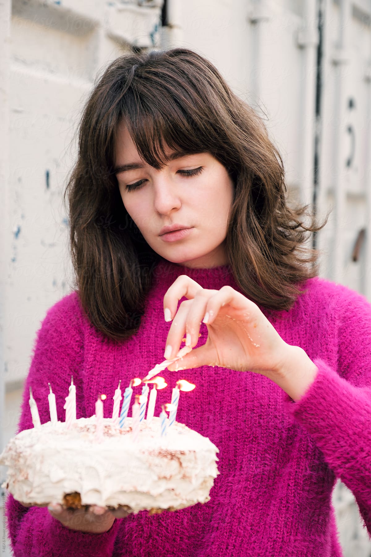 "Girl Lighting Candles On Birthday Cake" by Stocksy Contributor "Danil ...