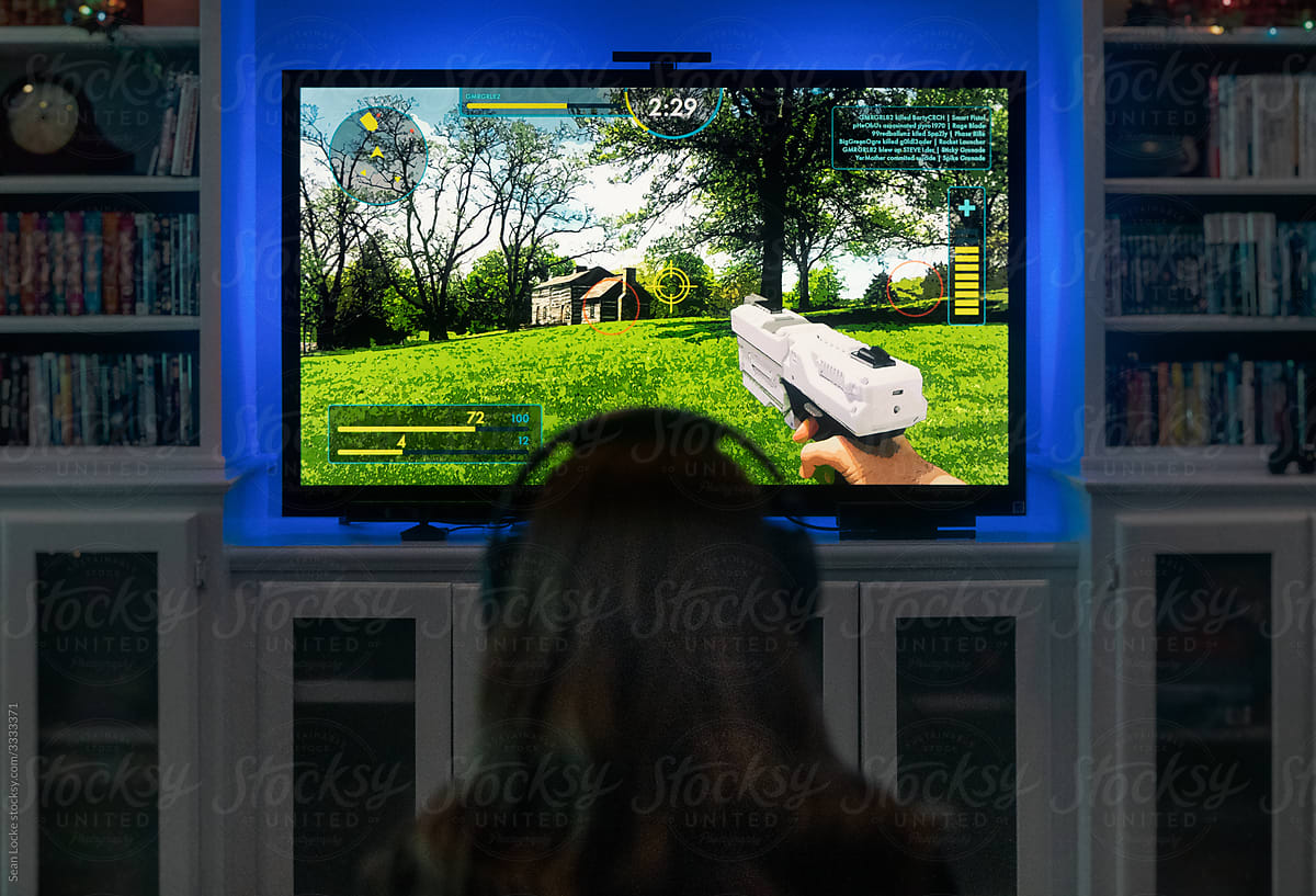 "Girl Plays Modern Shooter Video Game On TV" by Stocksy Contributor ...