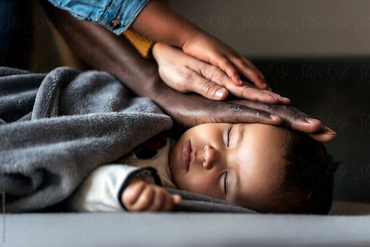 "Family Together Protect Baby" by Stocksy Contributor "Santi Nuñez ...
