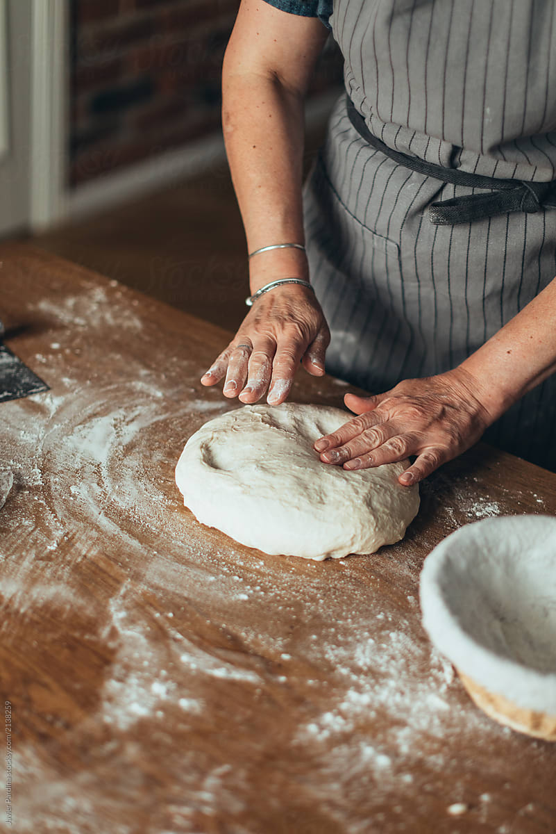 "Artisan Woman Preparing Bread" by Stocksy Contributor "Pardina Studio ...
