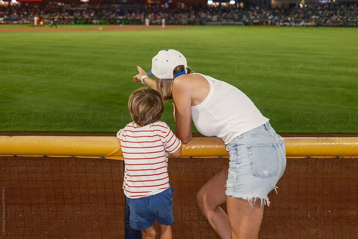 "Watching Baseball Game" by Stocksy Contributor "J. Anthony" - Stocksy