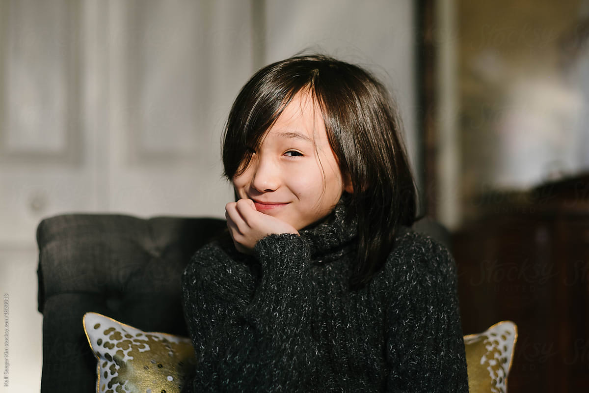 "Young Boy In Sweater" by Stocksy Contributor "Kelli Seeger Kim" - Stocksy
