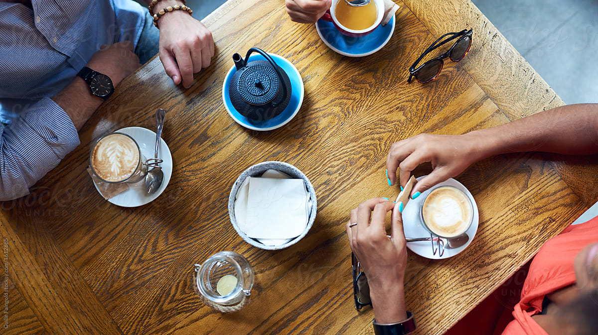 "People Hanging Out In Cafe With Cups Of Coffees" by Stocksy ...