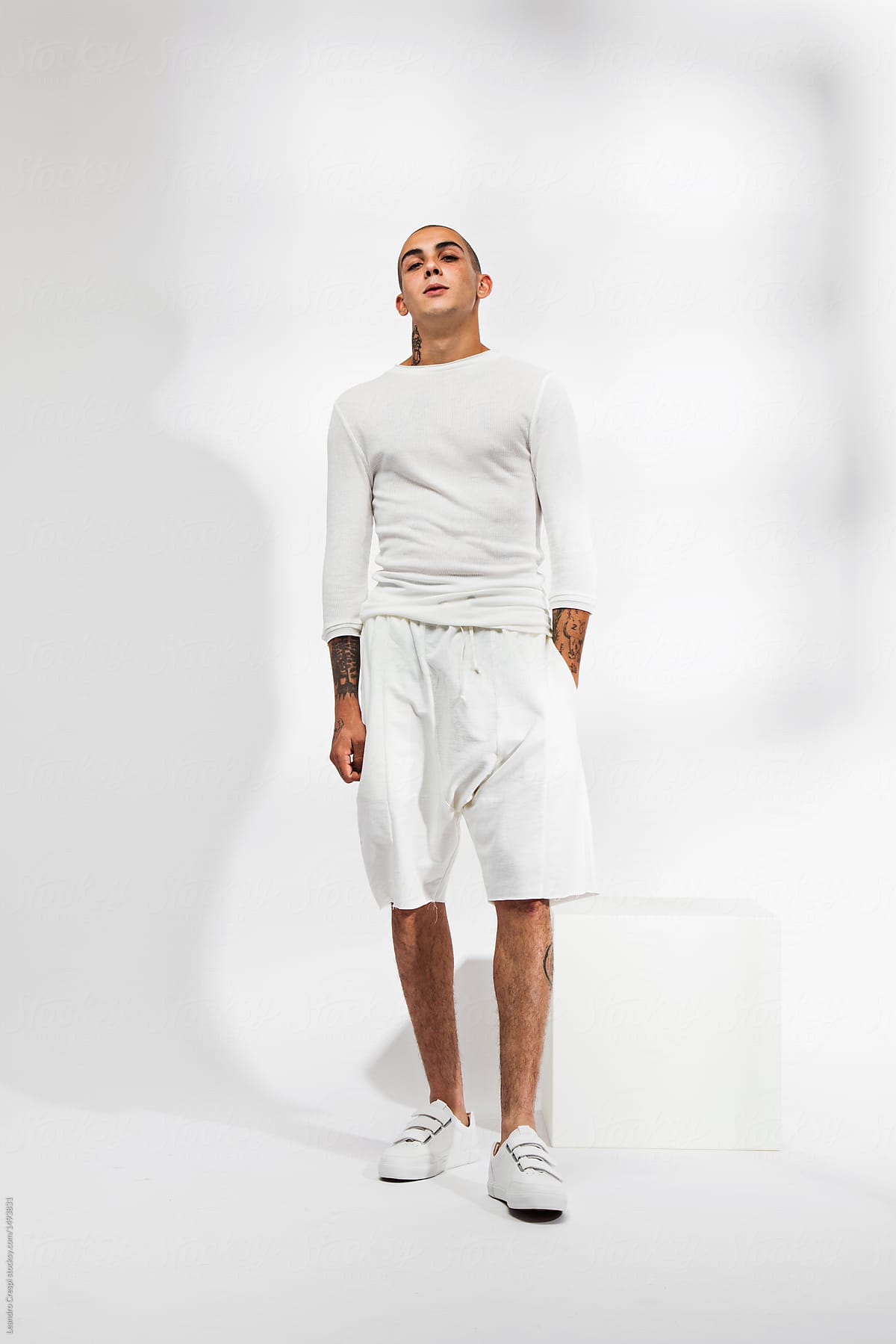 "Cool Guy In White Clothing" by Stocksy Contributor "Leandro Crespi ...