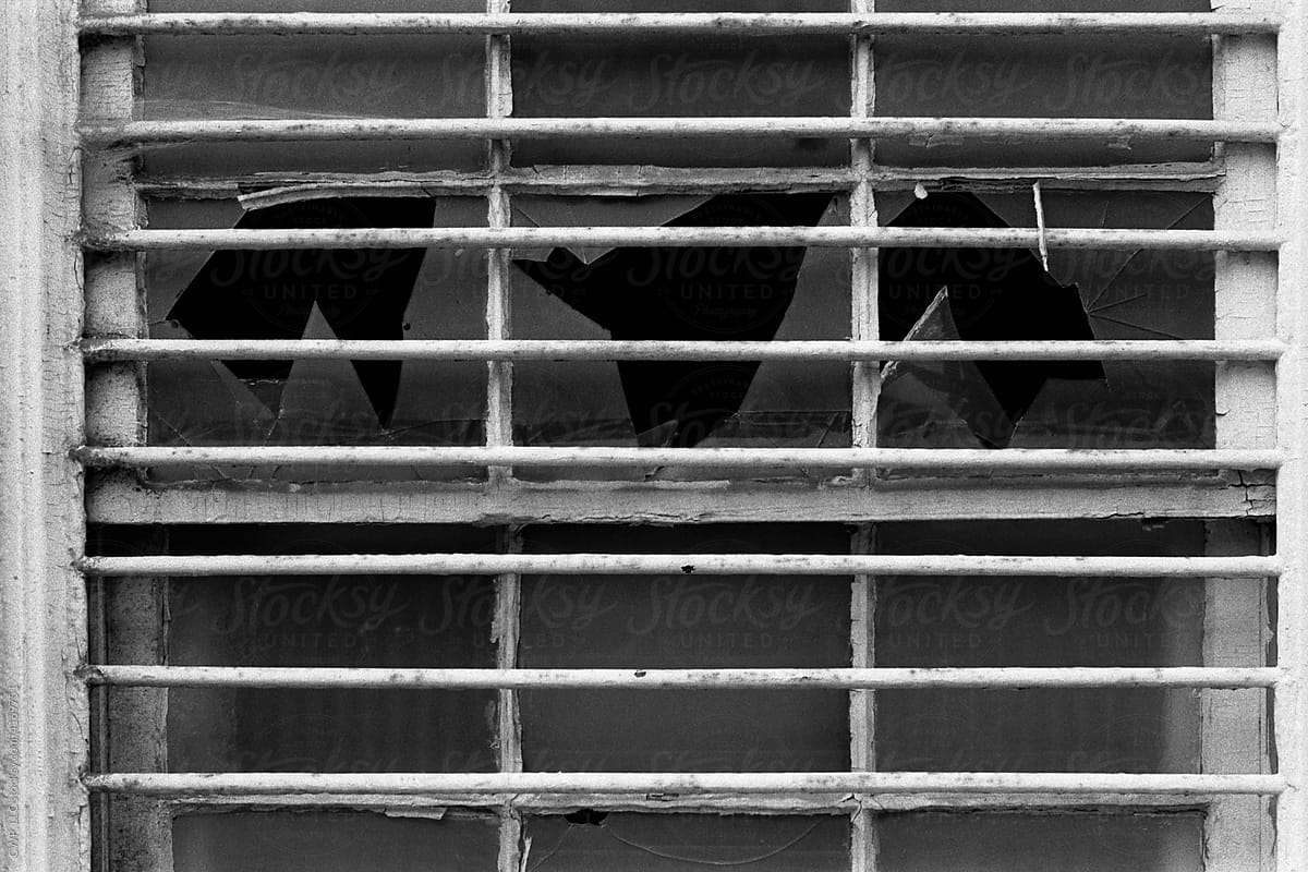 Barred Up Windows A Close Up Of A Barred Window On A Brick Wall Photo