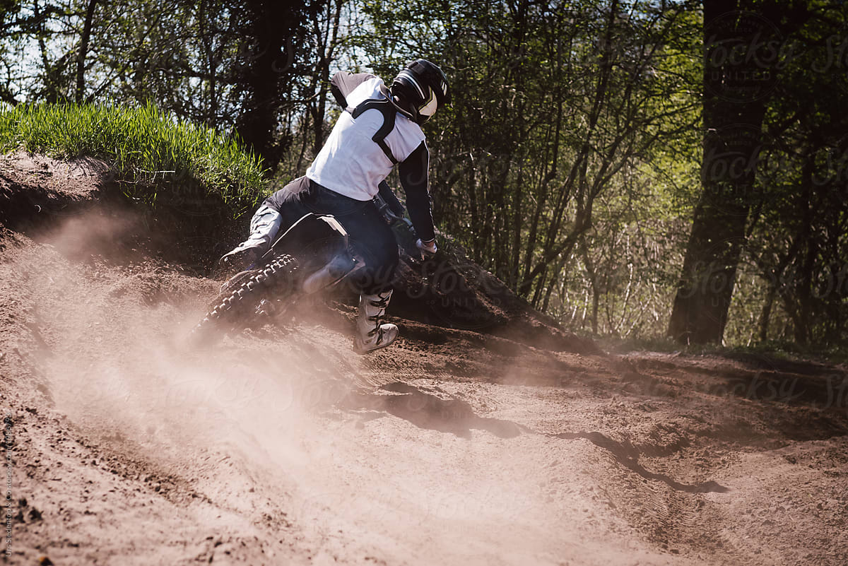 "Motocross Driver Turning" by Stocksy Contributor "Urs Siedentop & Co ...